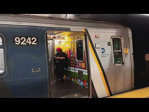 R160s #9242 & #8657 (R) via 63rd [w/ NYS wrap only on 9241 & 9242] leaving Roosevelt Island
