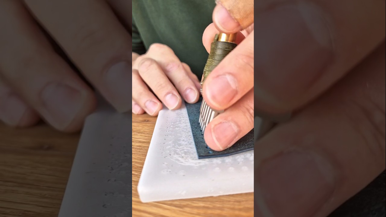 Preparing a leather wallet using a mallet from @ForgedSteelTools #leathercraft #leathercrafting