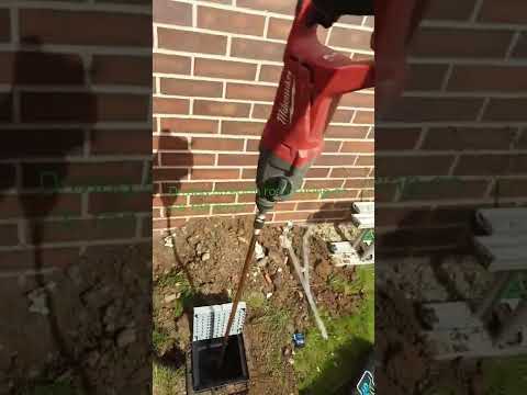 sds driving the earth rod into thr ground....