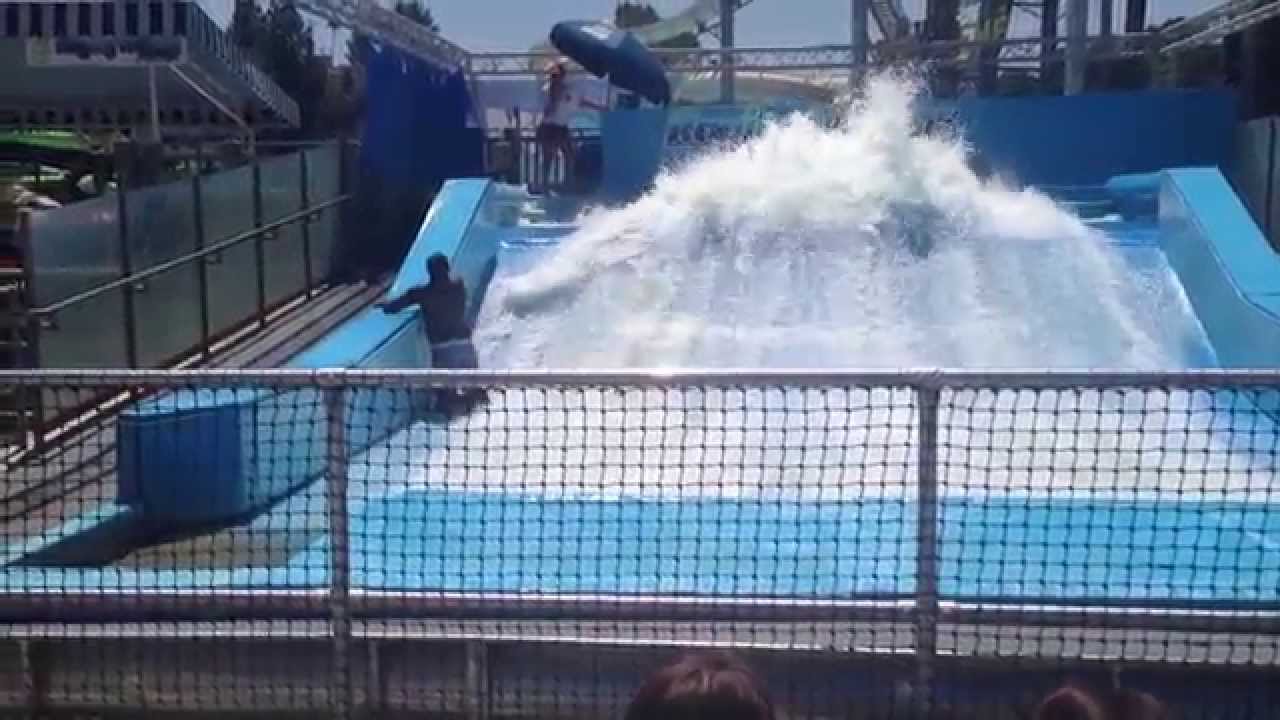 Dude in the act of wiping out on FlowRider, Raging Waters lol