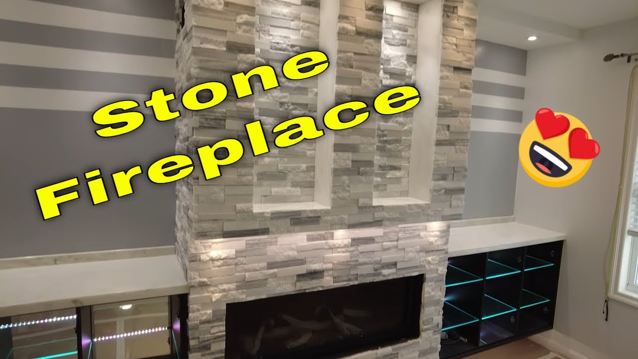 Stacked stone Fireplace setting the stone.