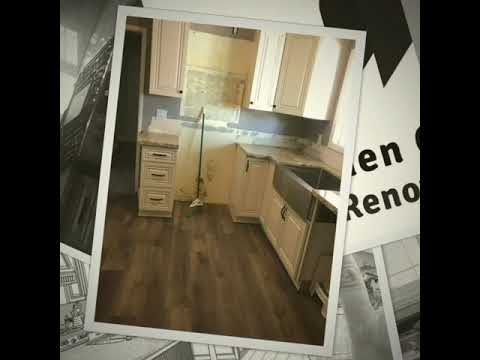 Cabinets Antique White, Granite Countertop Namib Gold and full Backsplash Aria Oro 2X4 Mosaic