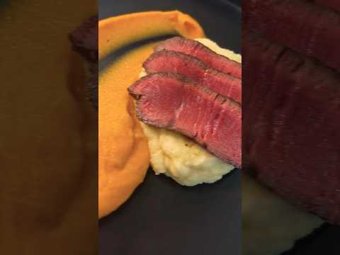 "Filet Mignon Medium Rare with Sweet Potato and Parsnip Puree, Drizzled with Red Wine Reduction"