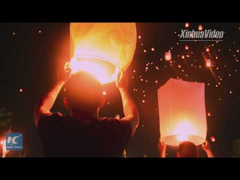 Dai people in SW China fly sky lanterns to celebrate New Year
