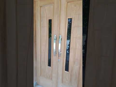 Pintu kupu tarung jati TPK, motif S kombinasi kaca. .