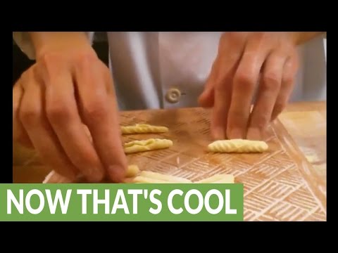 Chef demonstrates how to create designs on pasta