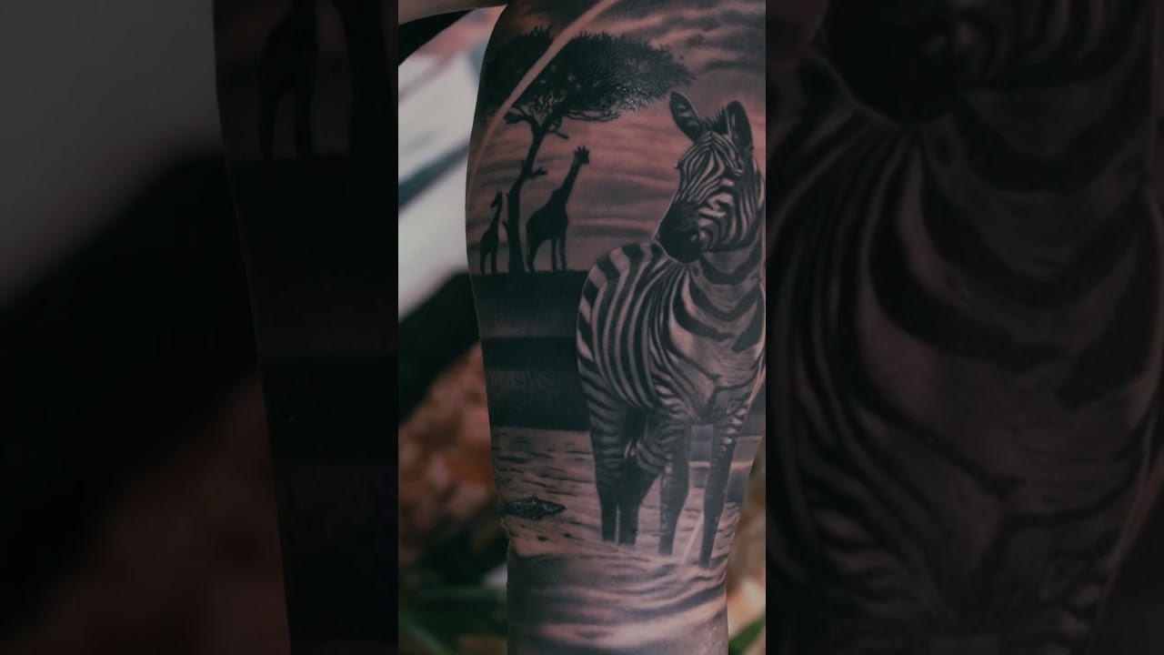 Jaw-droppingly awesome realism sleeve at No Regrets Tattoo Studio