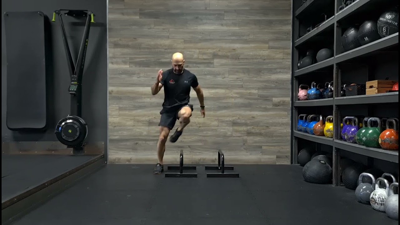 Alternating lateral skip over parallettes