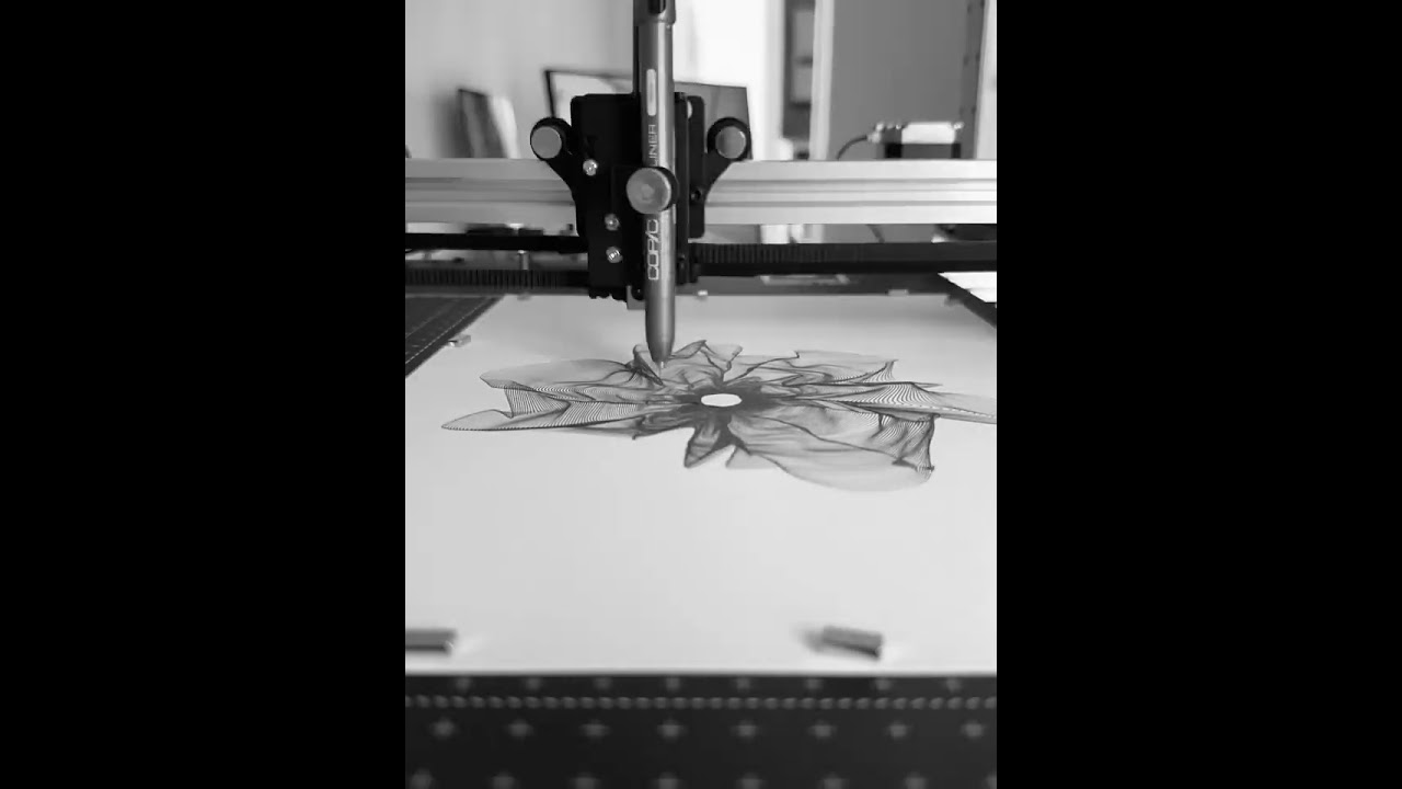 Watch a Robot Draw a Math Mystery!