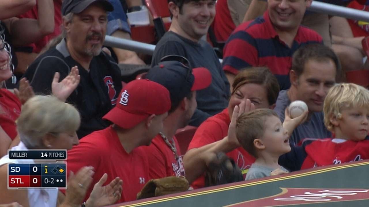 Young fan throws back foul, gets it back