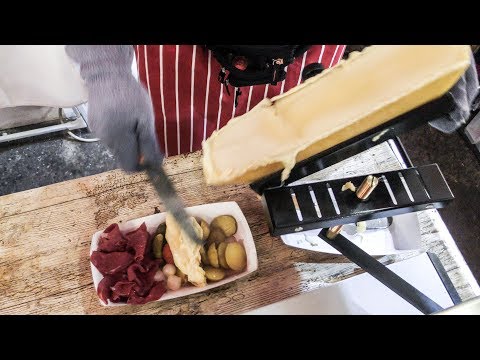 Swiss Raclette of Melted Cheese Tasted in London. World Street food