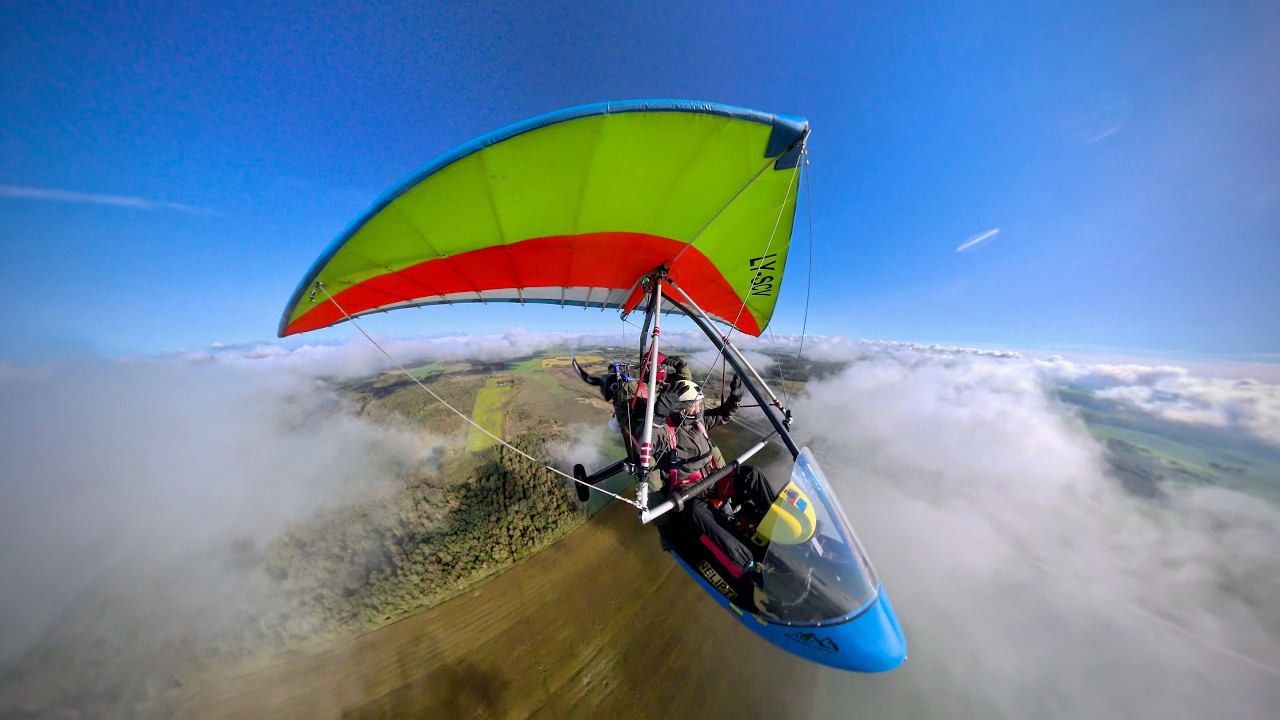Foggy Morning Flight: Ultralight Trike Adventure Above the Clouds