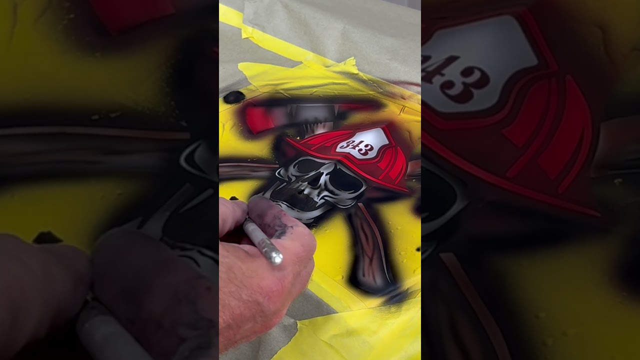 Airbrushing the 911 tribute skull firefighter