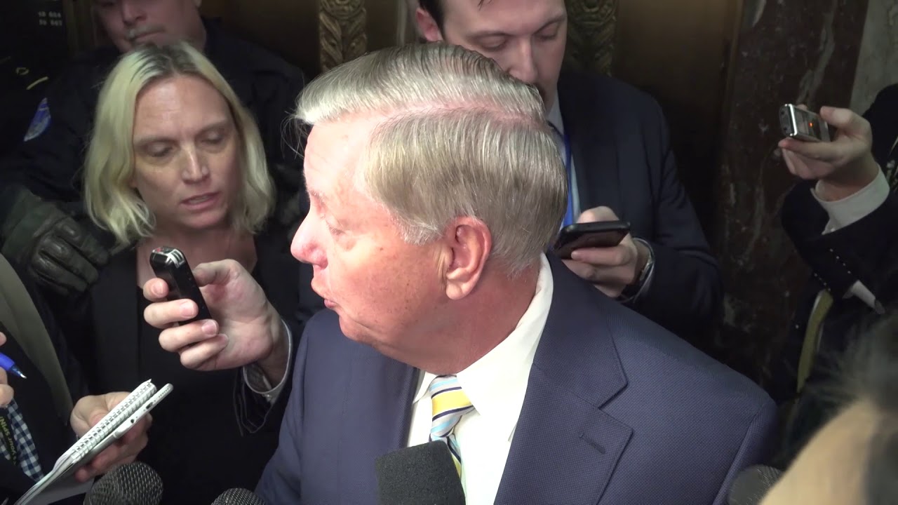 Protesters shout down senators after GOP tax bill committee vote