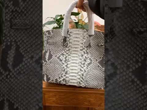white snake skin bag