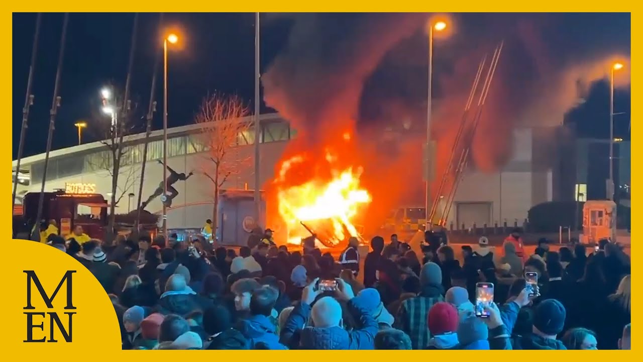 Moment huge fire erupts outside Etihad Stadium as thousands of fans ...