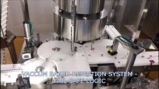 Automatic vial cap sealing machine with rejection system - N.K. INDUSTRIES