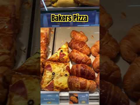 buying bakers pizza at the french baker!!