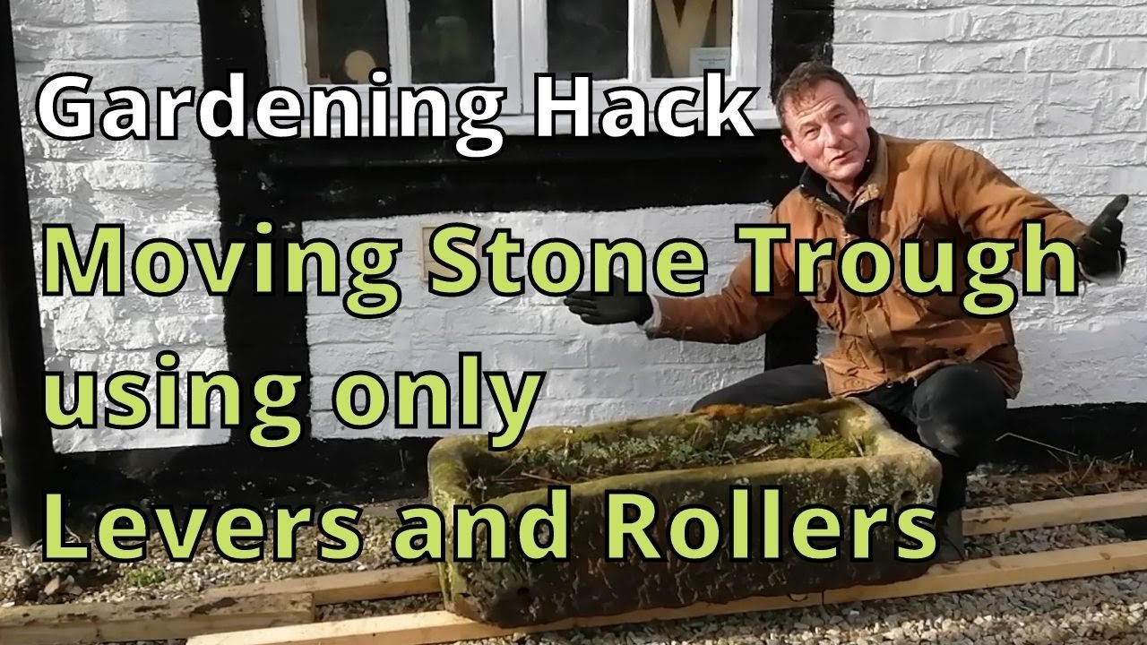 Gardening Hack | Moving Large Stone Trough using only wooden rollers and levers.