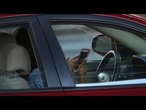 Cameras to catch drivers using mobiles in Qld
