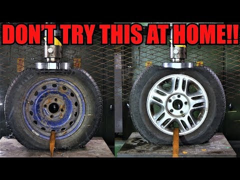Watch This Wheel Explode Into a Dozen Pieces - Hydraulic Press Crushes ...
