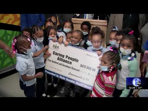 6ABC Sen. Street Presents Caring People Alliance with Check for Anti-Violence Work