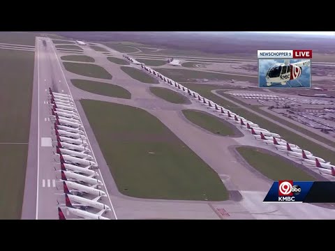 Delta Airlines parking planes on runway at KCI Airport