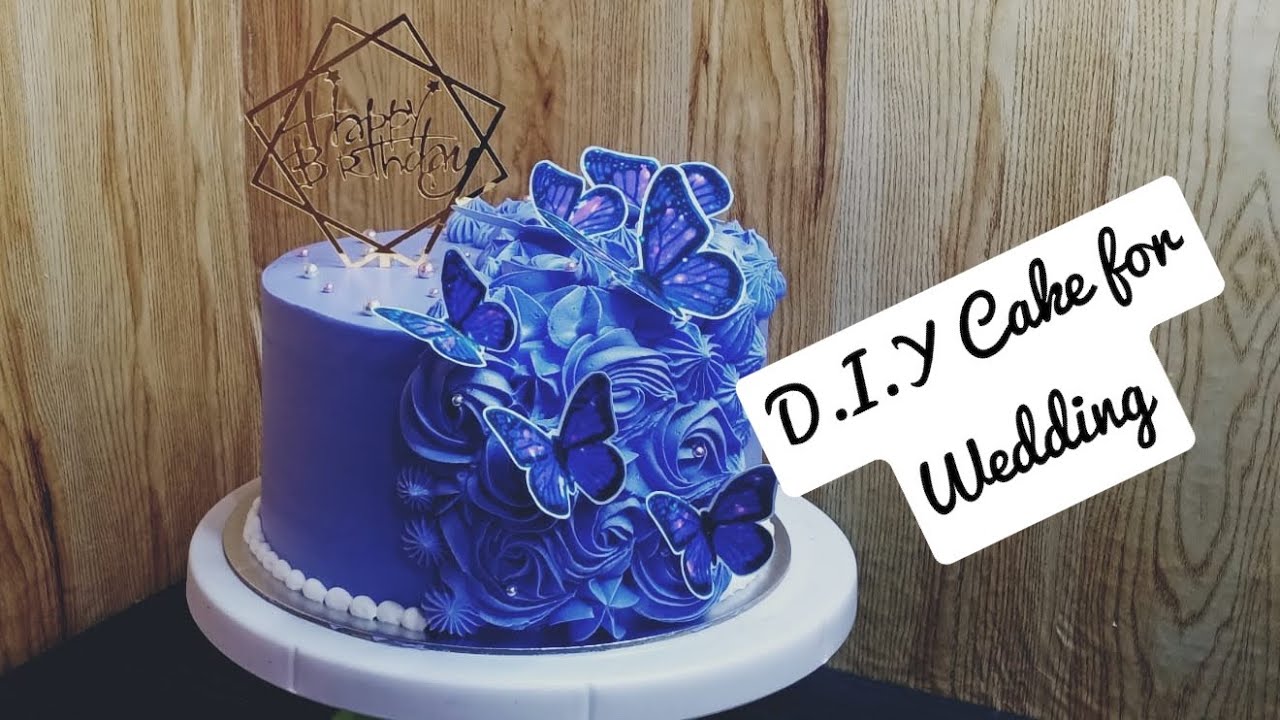 Smart Design  of Purple Butterfly theme cake (Either Birthday or Wedding Cake)