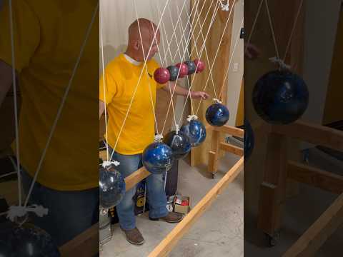 Newton’s Cradle made of bowling balls demonstrates laws of motion #physics #science