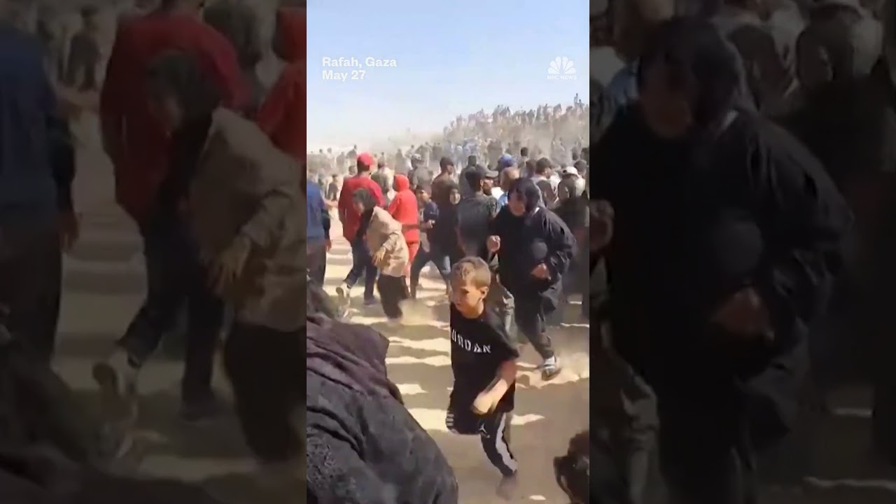Crowds rush into aid distribution center in Gaza
