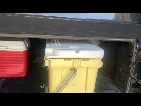 Yukon Outfitters YKO 20 QT cooler slides perfectly into Jeep JK Wrangler A+