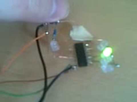 CD4017BE decade counter driving 4x green LEDs.