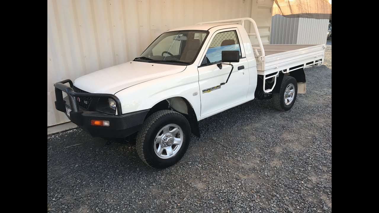 (SOLD)4x4 Ute Low KM for sale. Mitsubishi Triton review with steel tray and hardwood deck 2002