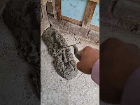 spreading portland cement for my 4inch block base. new step in the works#construction #satisfying
