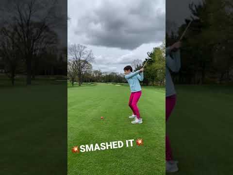 8 year old lefty girl golfer drives it down the fairway