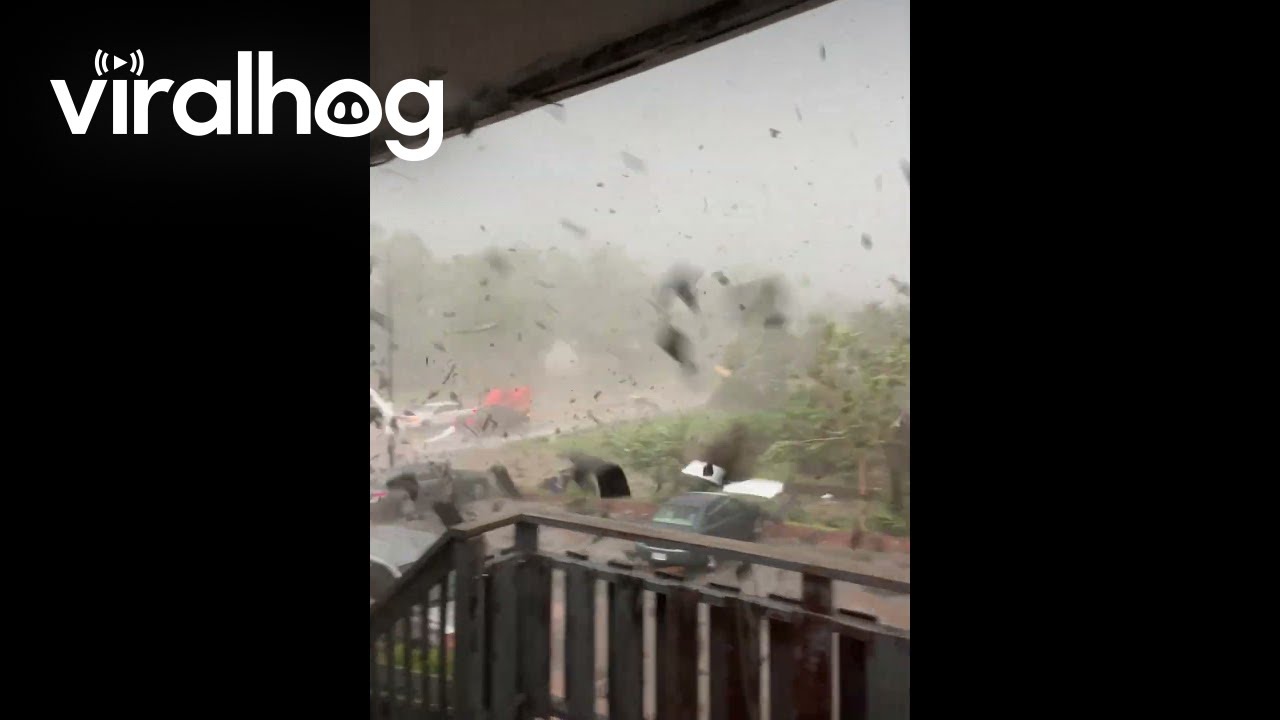 Man Watches Tornado Destroy His Apartment || ViralHog