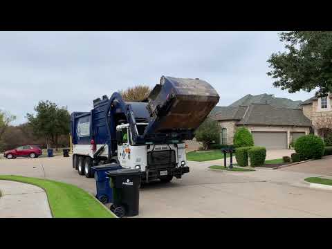 One of The Fastest Waste Connections Front Loaders: Autocar ACX With Blue Curotto Can