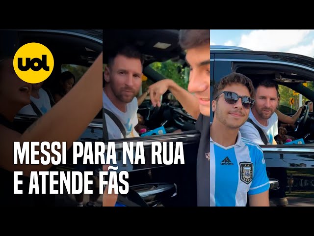 Messi para carro na rua, atende fãs e posa para fotos; veja