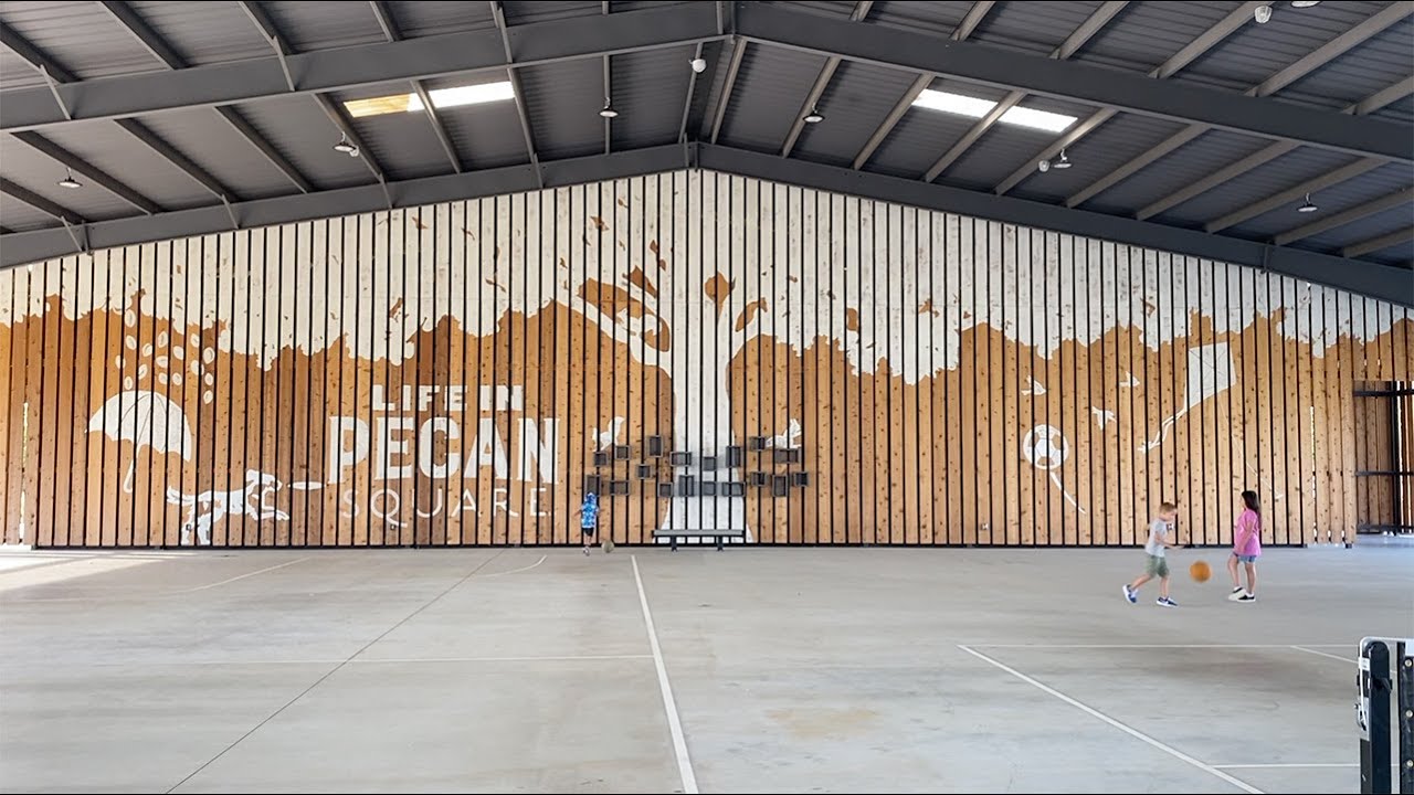 Pecan Square Arena wall mural installation