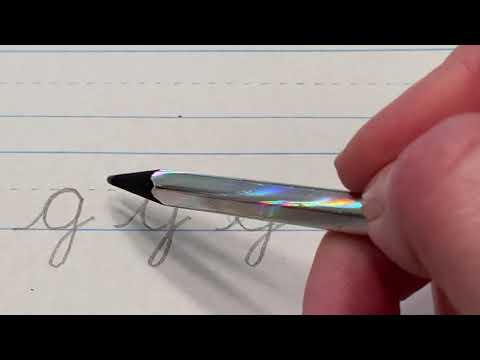 Lowercase "g" in cursive