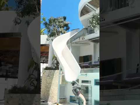 SEXY AND BEAUTIFUL GIRLS DOING SWIMMING POOL SLIDES IN CANGGU VILLAGE BALI