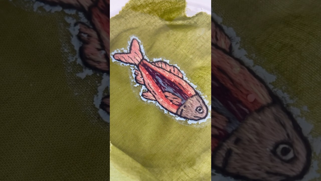 Washing stick and stitch paper to reveal fish embroidery #handbroidery #diy #bagcharm