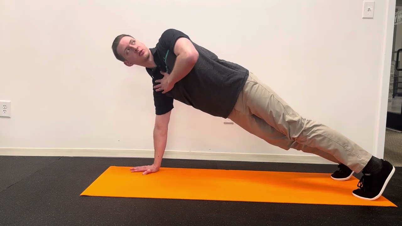 Plank with shoulder taps (rotation progression)