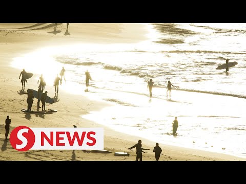 Australia earns an 'early mark' and now reviews easing measures
