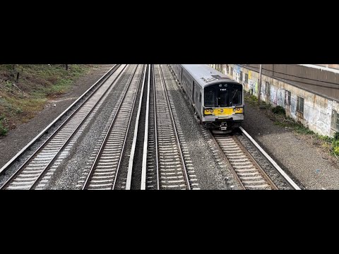 Long Island Rail Road LIRR 2 trains passing opposite directions in Forest Hills NYC