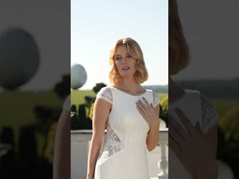 An elegant wedding gown with a bateau neckline