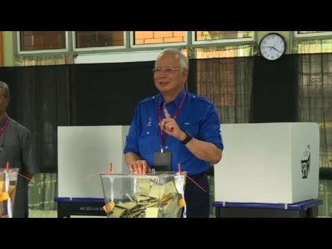 Prime Minister Najib Razak votes in Malaysia election