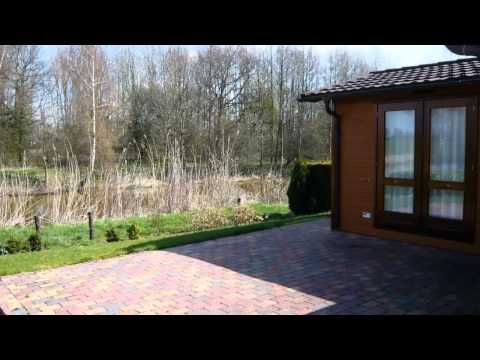 Stacaravan/chalet te koop: CHALET L-VORM DIRECT AAN HET WATER
