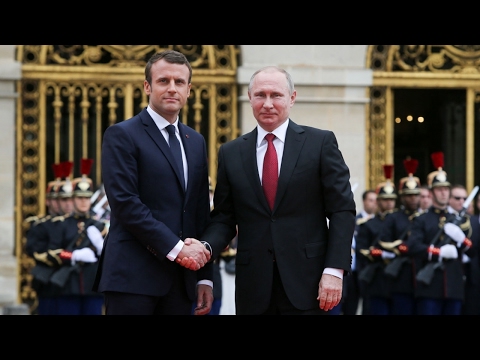 Macron, Putin have tense meeting