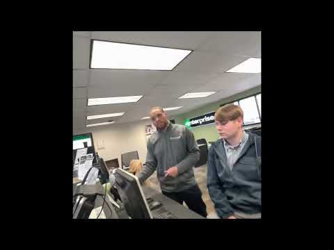 Enterprise Rent-A-Car Clerk calls a frustrated customer an A$$HOLE several times after their error!